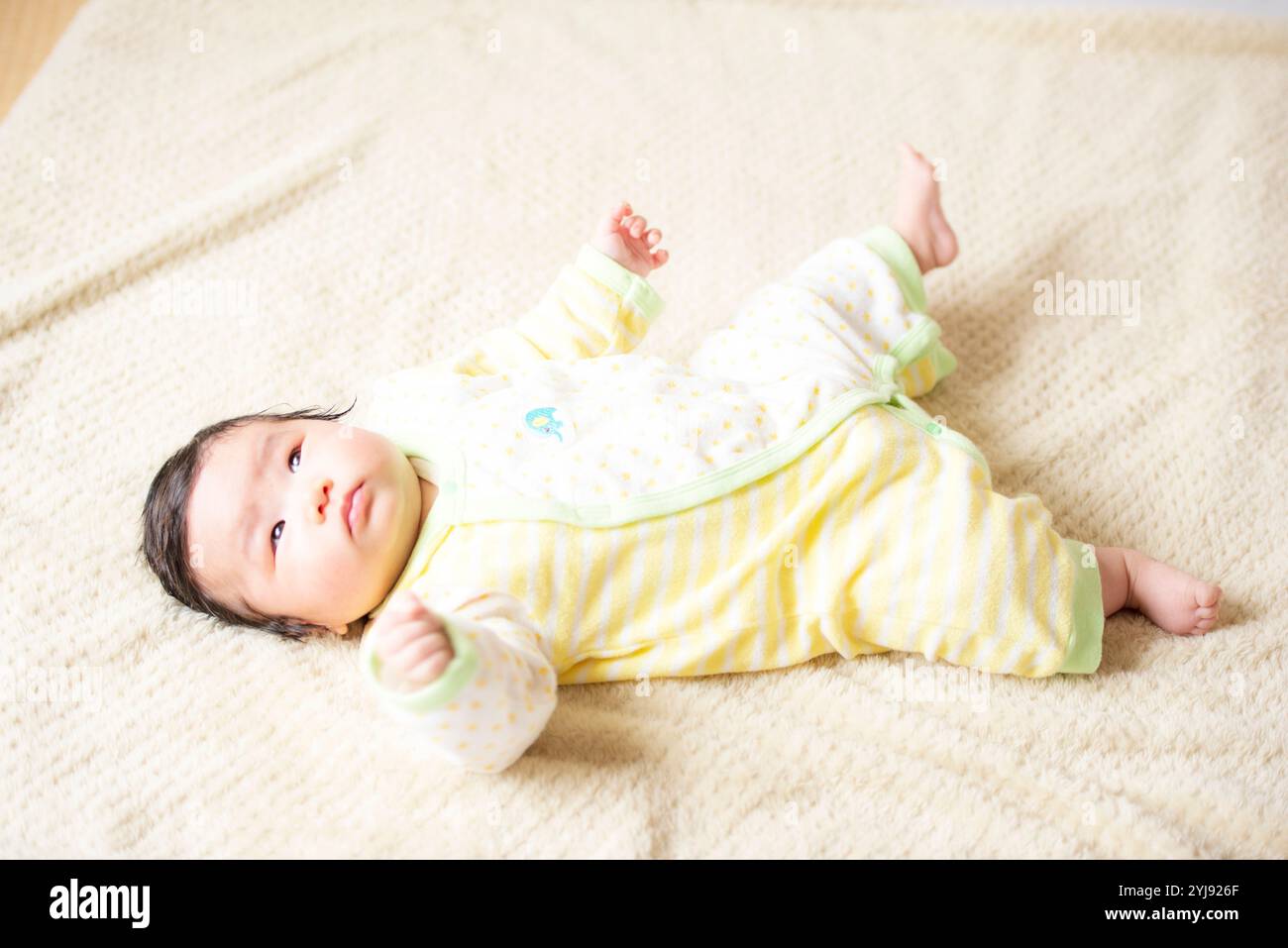3 months old Baby moving arms and legs vigorously Stock Photo - Alamy