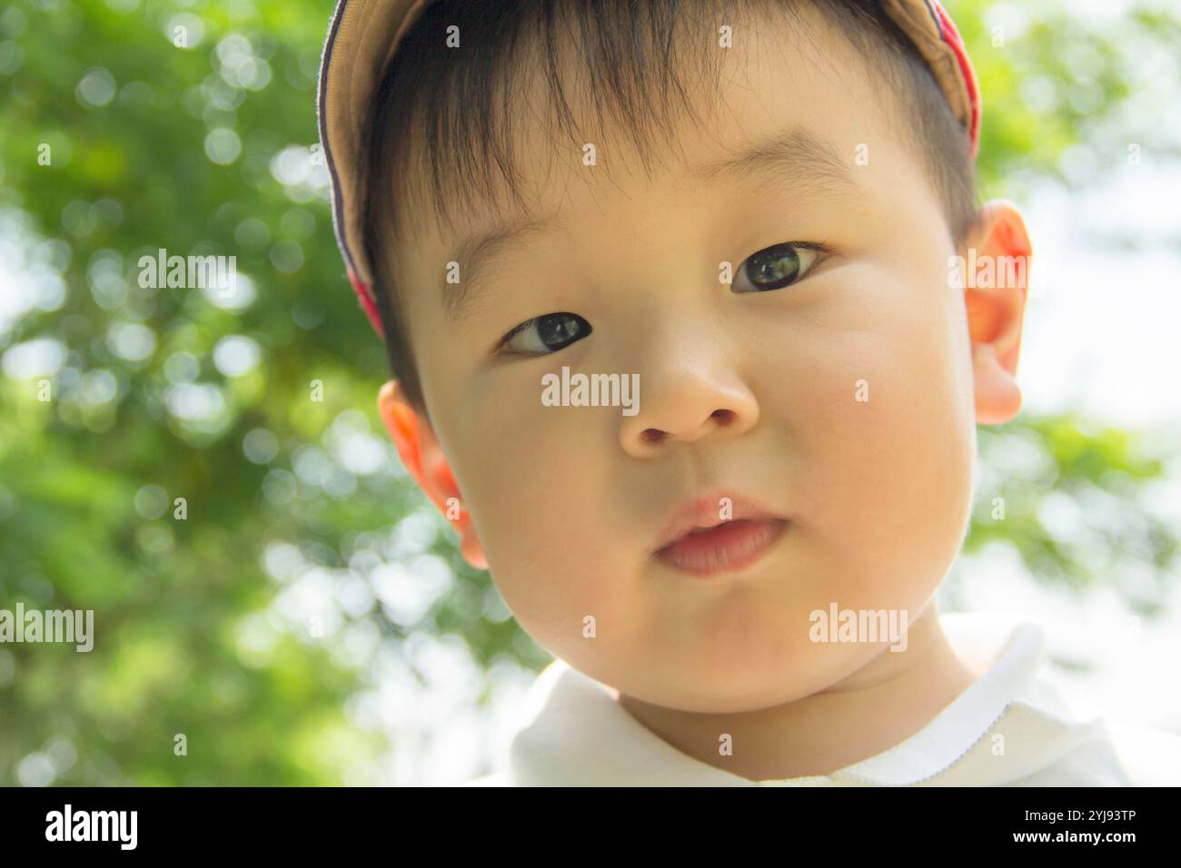 Boy looking at camera hi-res stock photography and images - Alamy