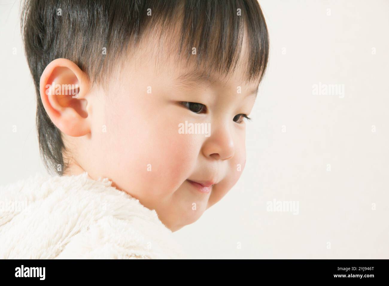 Boy in profile looking like he is thinking about something Stock Photo ...