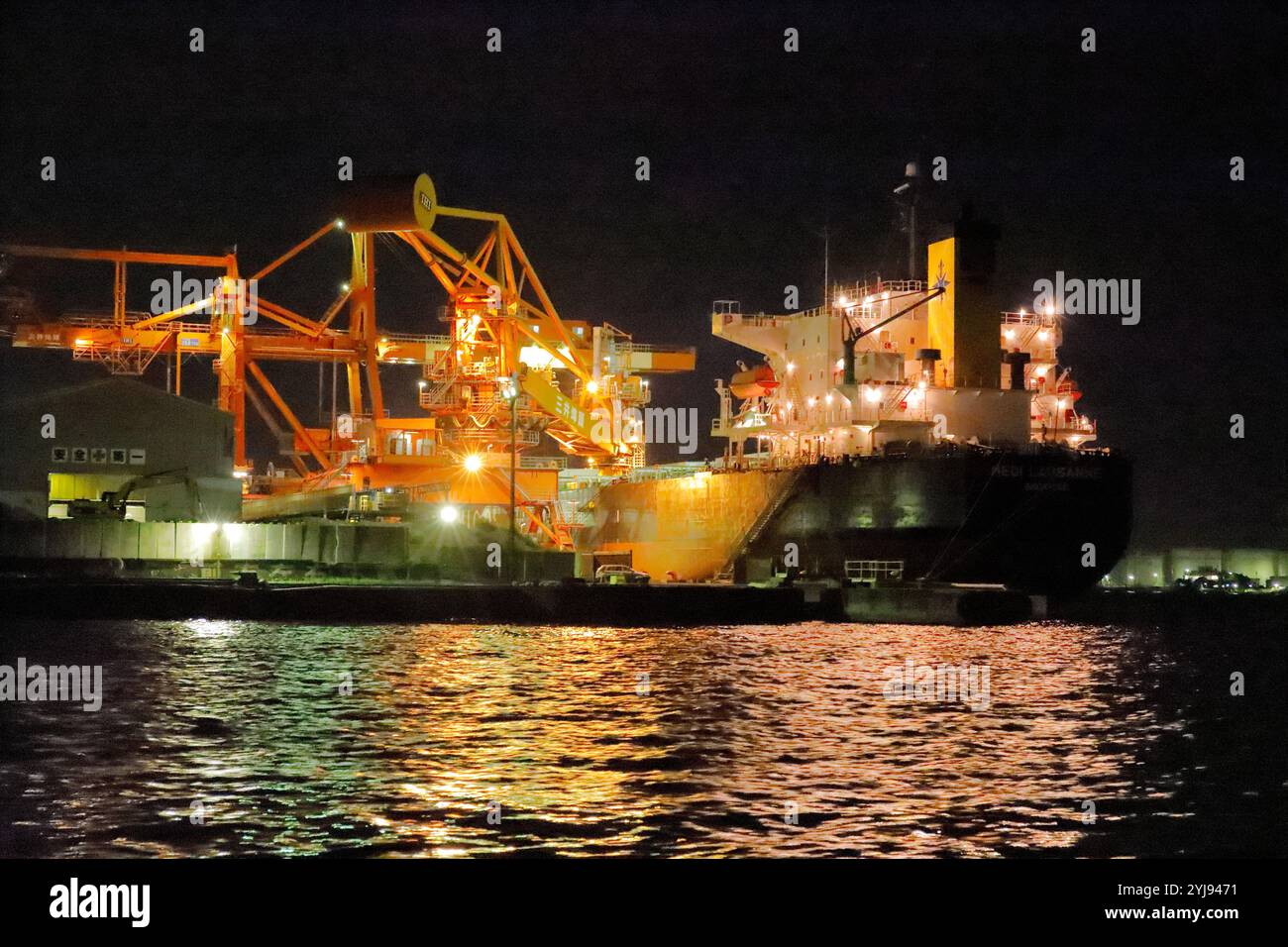 Night view of Mitsui Wharf from factory night view cruise ship Stock ...