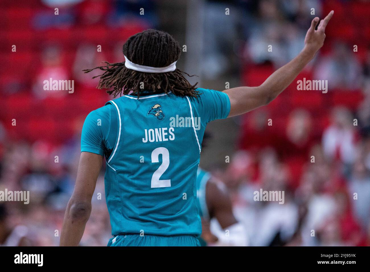 Raleigh, NC, USA. 13th Nov, 2024. Coastal Carolina Chanticleers guard ...