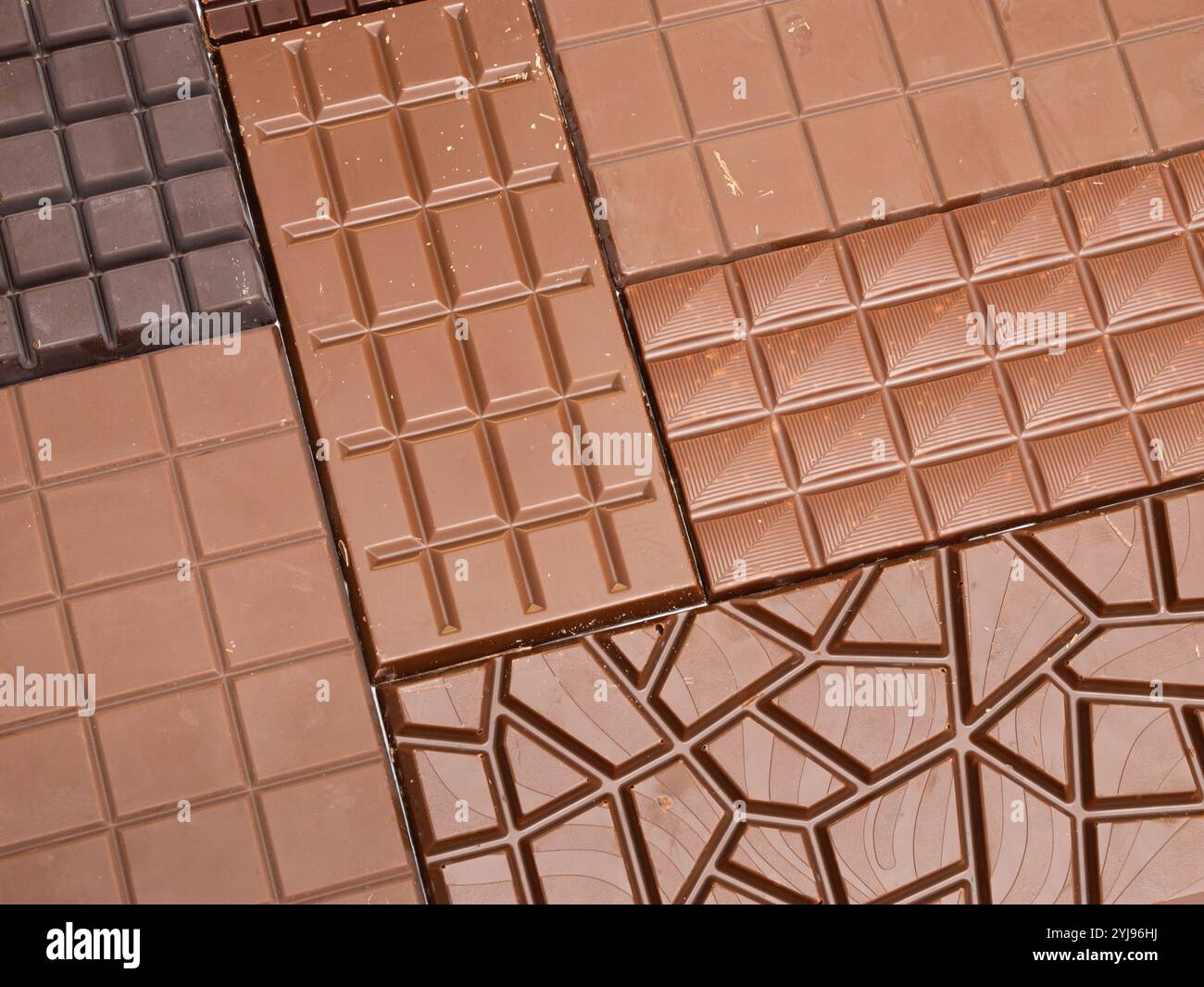 Chocolate bar background. Dark and milk chocolate filling the frame ...