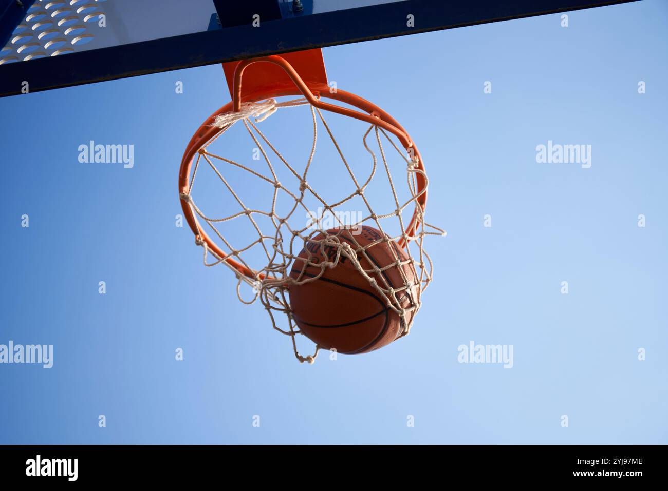 Blue sky and basketball goal and ball being shot Stock Photo - Alamy