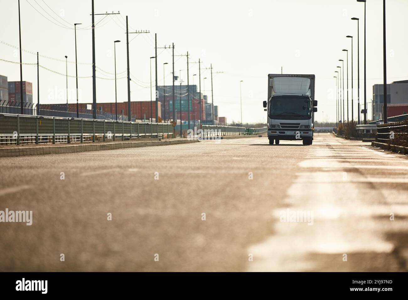 Truck running on a straight road Stock Photo - Alamy