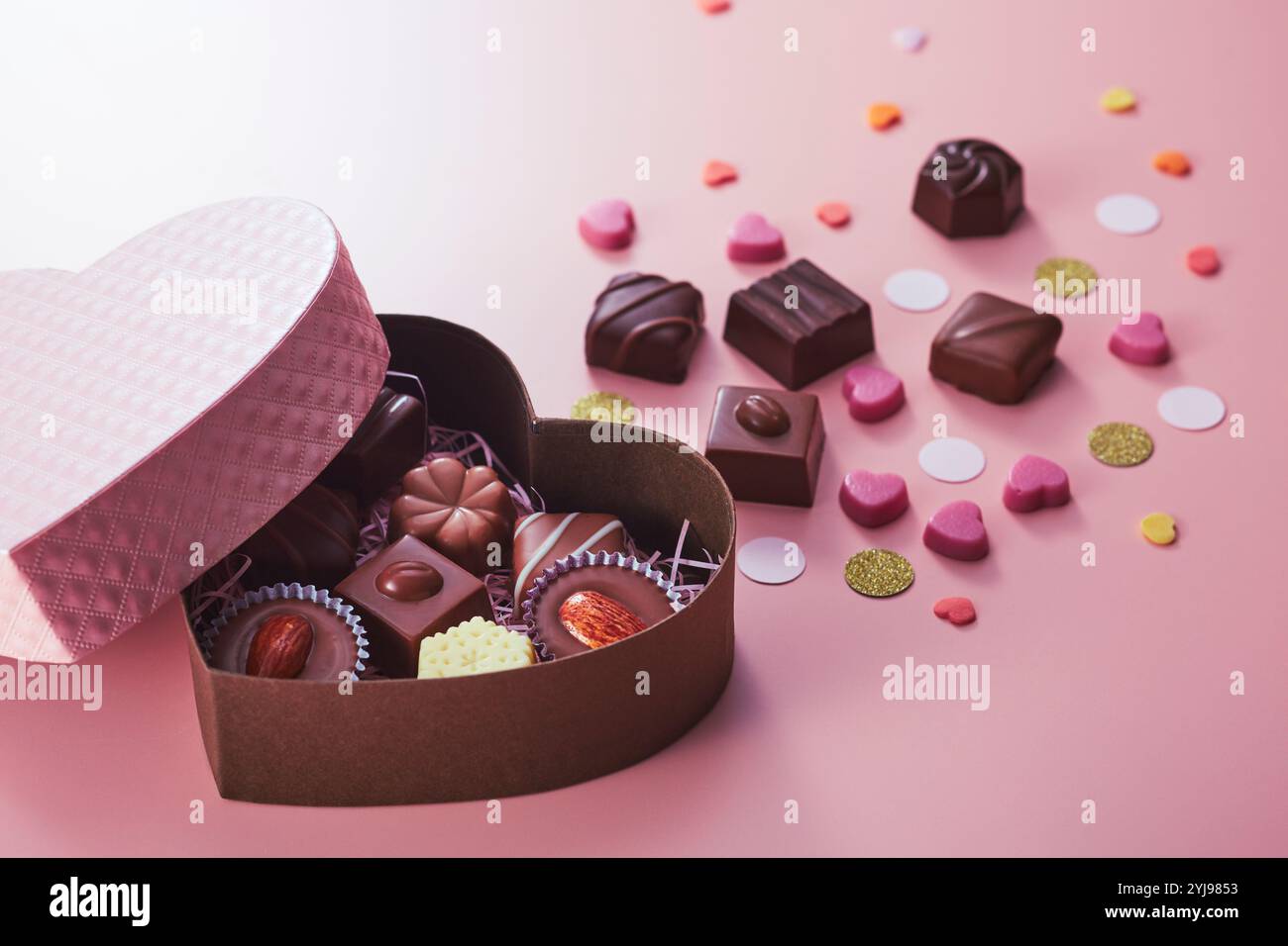 Heart-shaped box with chocolates Stock Photo - Alamy