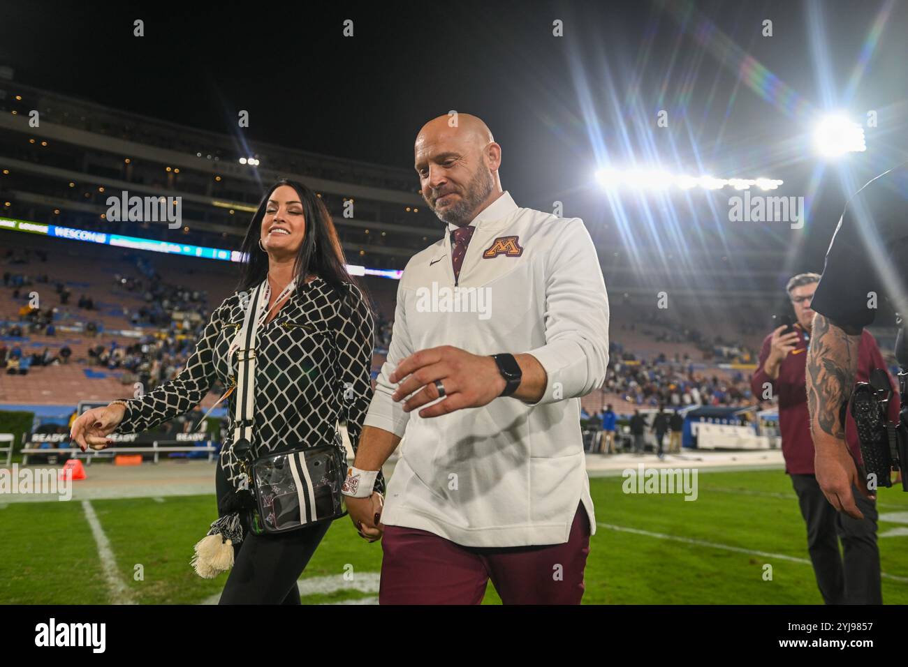 Minnesota Golden Gophers head coach P.J. Fleck and wife Heather Fleck ...