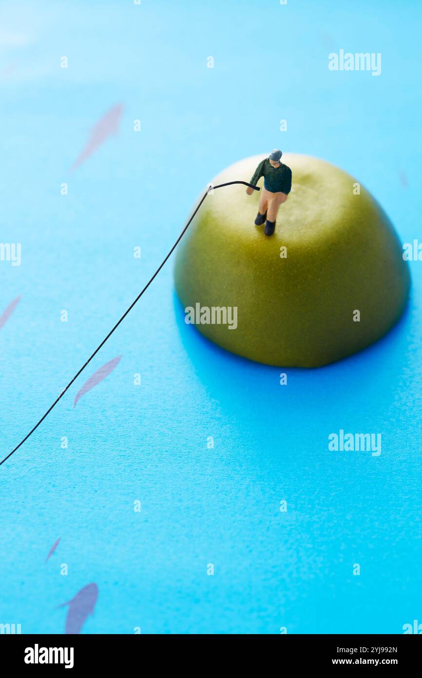 Miniature fishing on an isolated island Stock Photo - Alamy