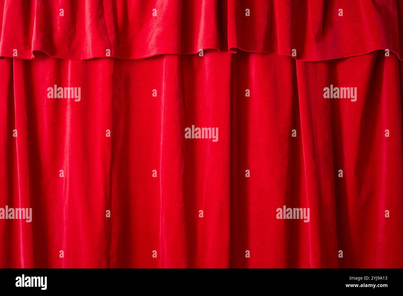 Screenful of red curtains Stock Photo - Alamy