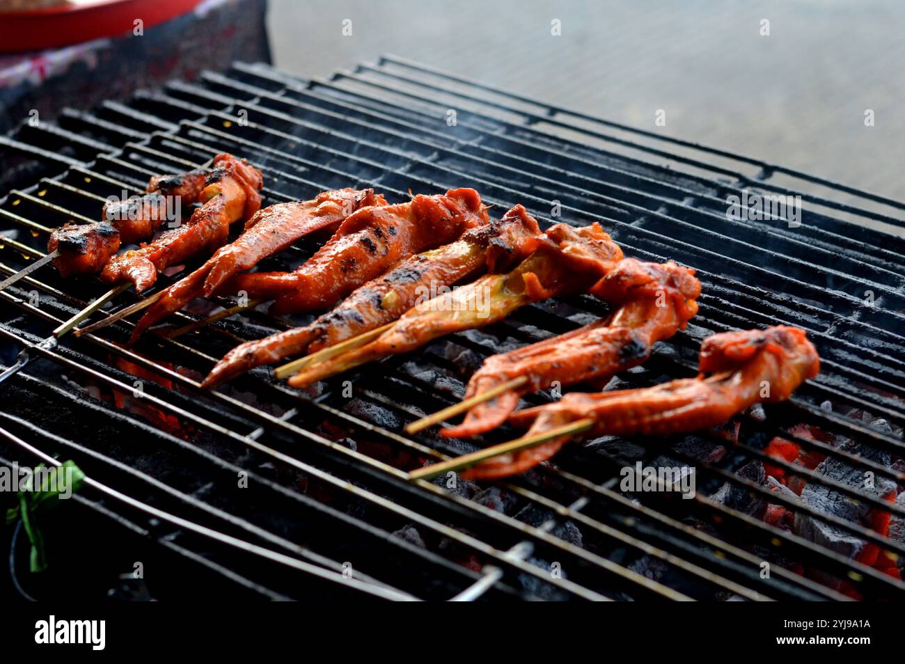 grilled chicken wings in the process of burning Stock Photo - Alamy