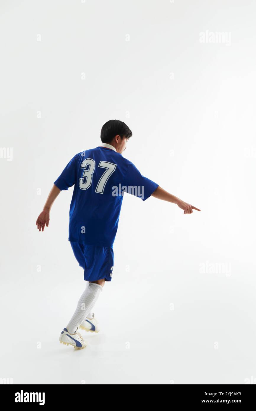 Footballer pointing one hand hi-res stock photography and images - Alamy