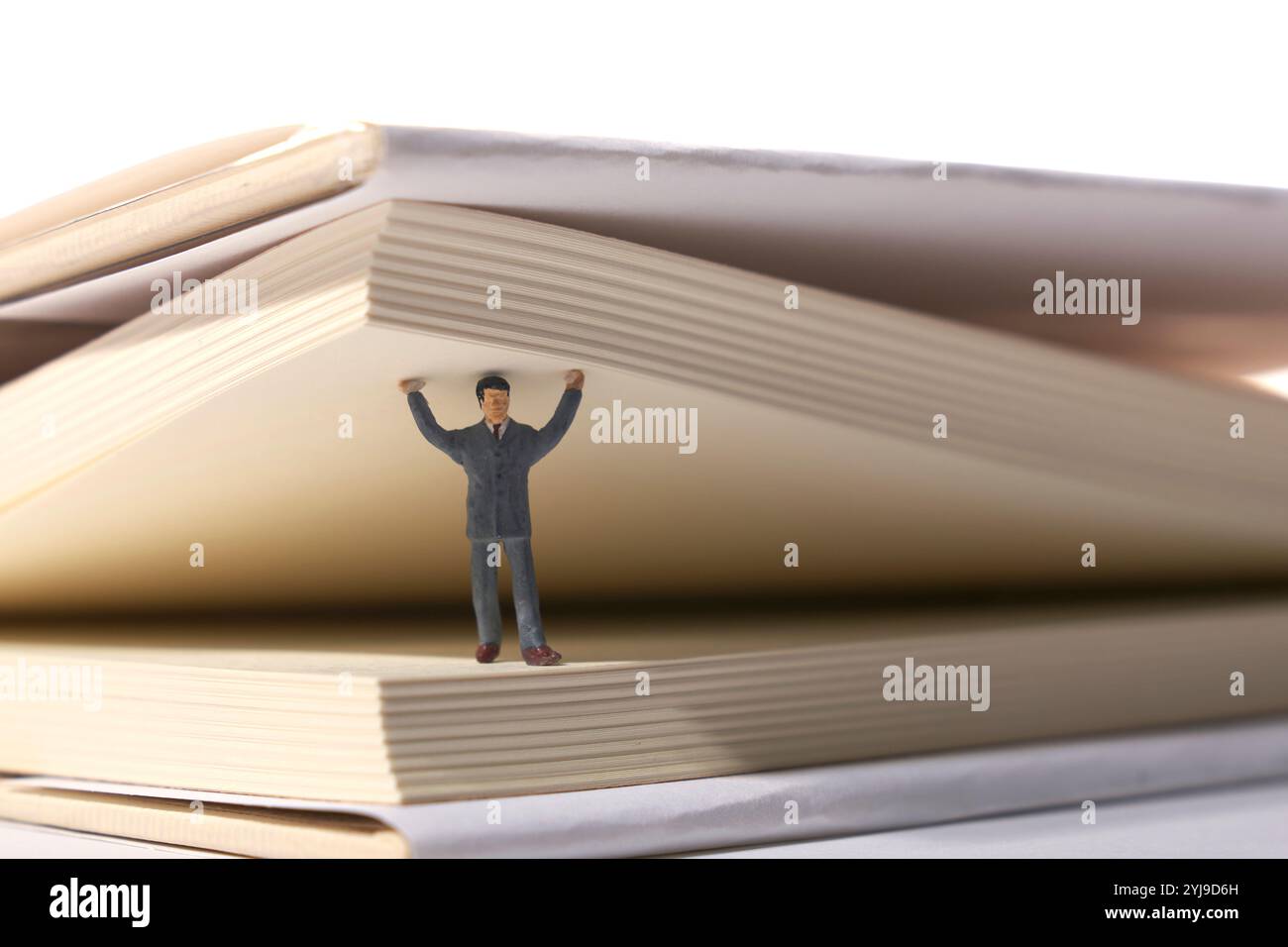 Miniature of a book page being lifted Stock Photo - Alamy