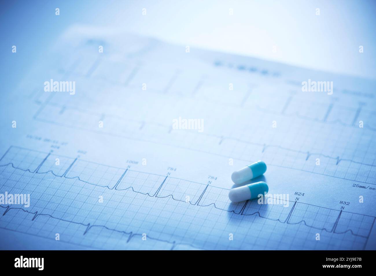 Corrugated and two pill capsules Stock Photo - Alamy
