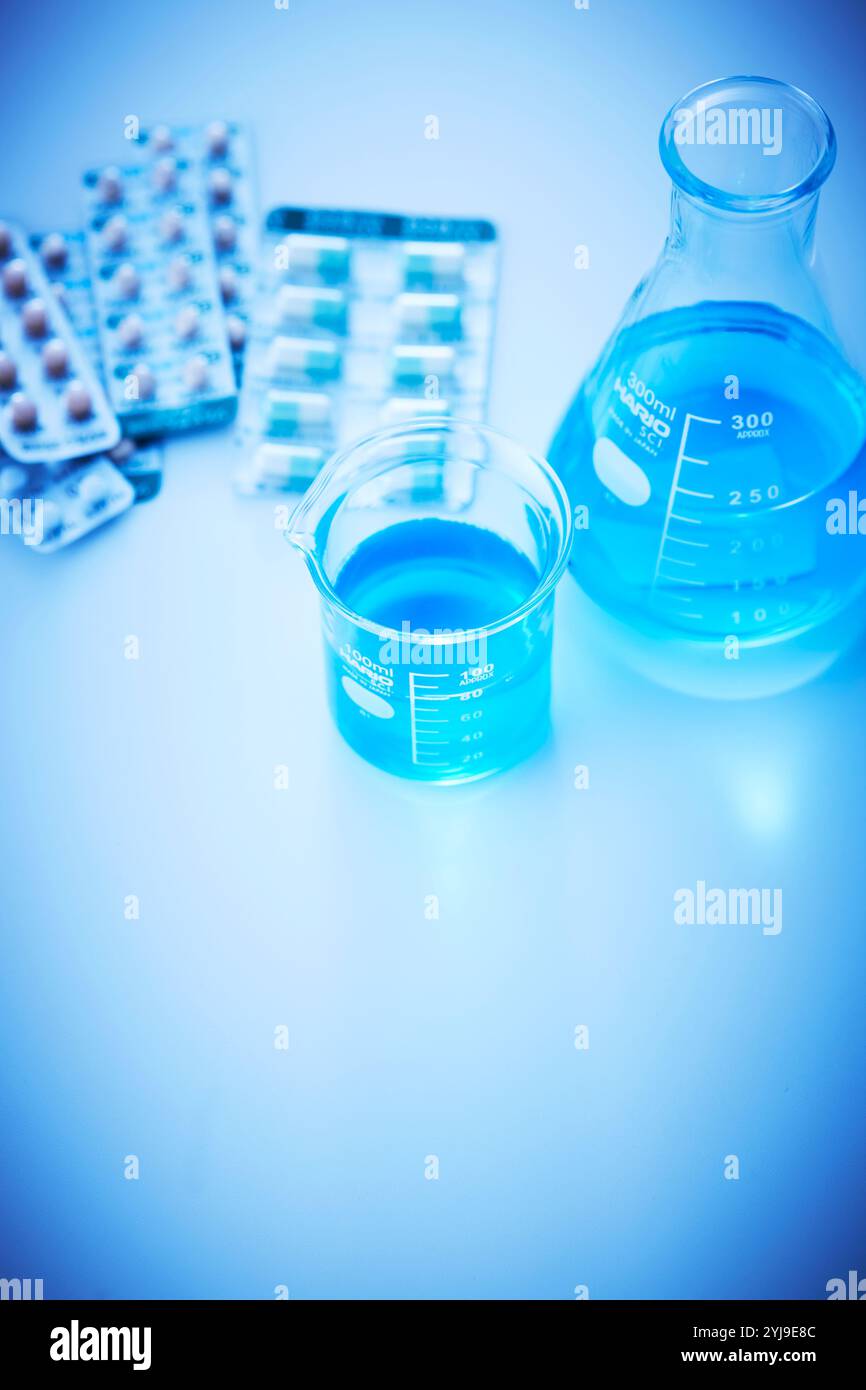 Erlenmeyer flask blue liquid beaker hi-res stock photography and images ...