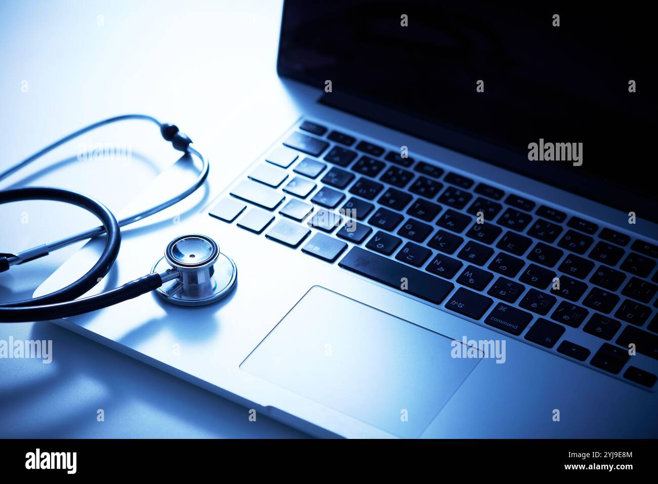Laptop and stethoscope Stock Photo - Alamy