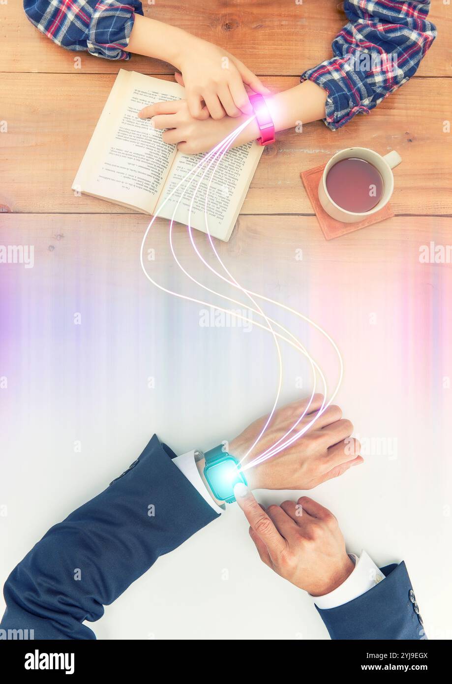 Rays of light connecting male and female smartwatches Stock Photo - Alamy