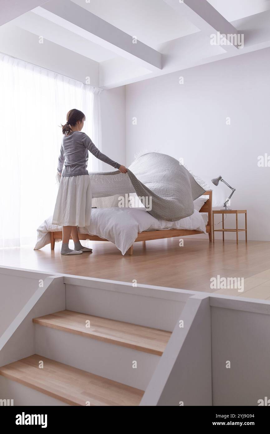 Woman in home clothes making hi-res stock photography and images - Alamy