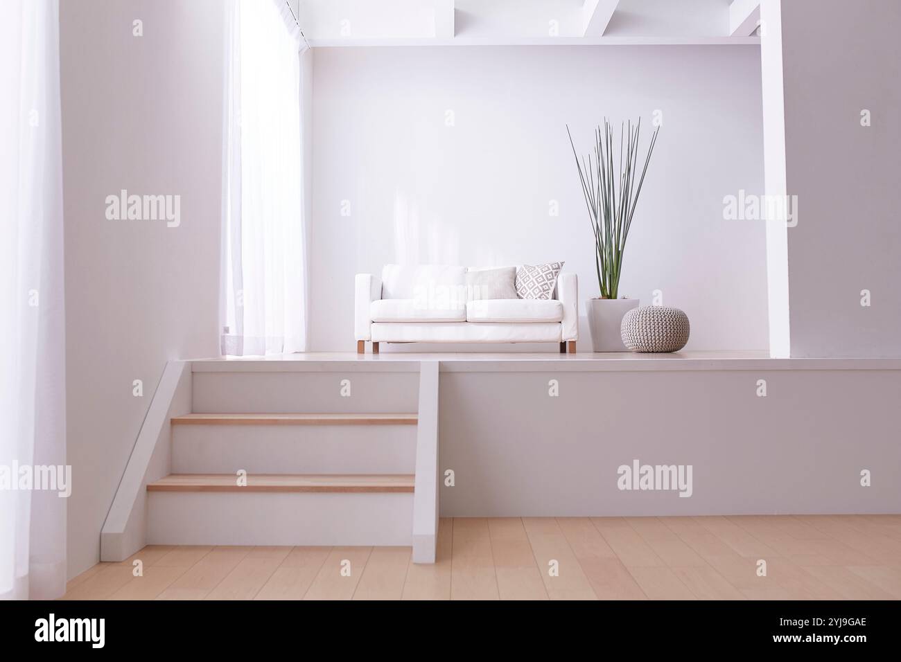 Large, simple room on step floor Stock Photo - Alamy