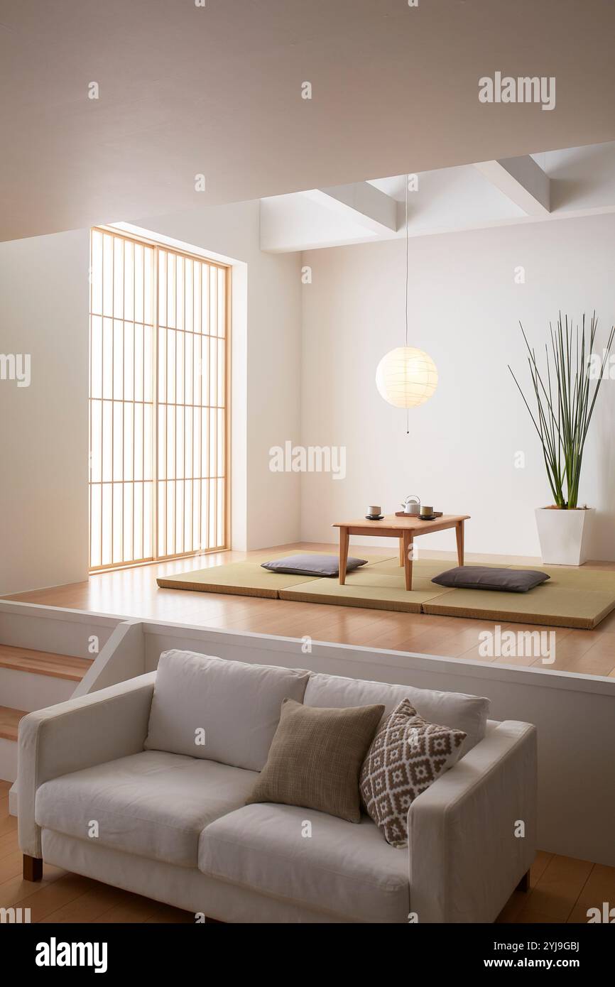 Simple living room with step floor Stock Photo - Alamy