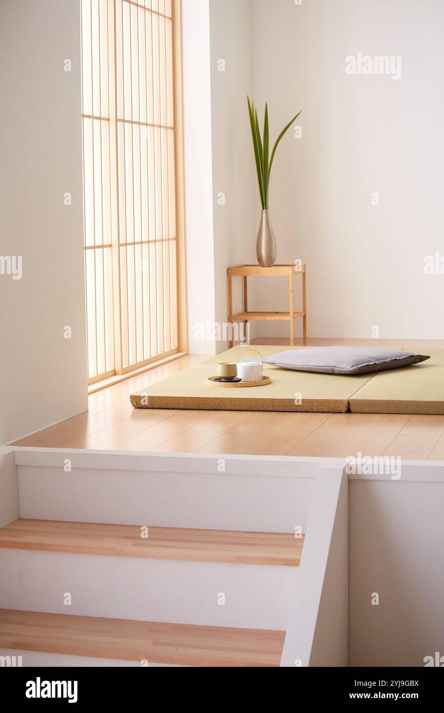 Simple Japanese room on step floor Stock Photo - Alamy