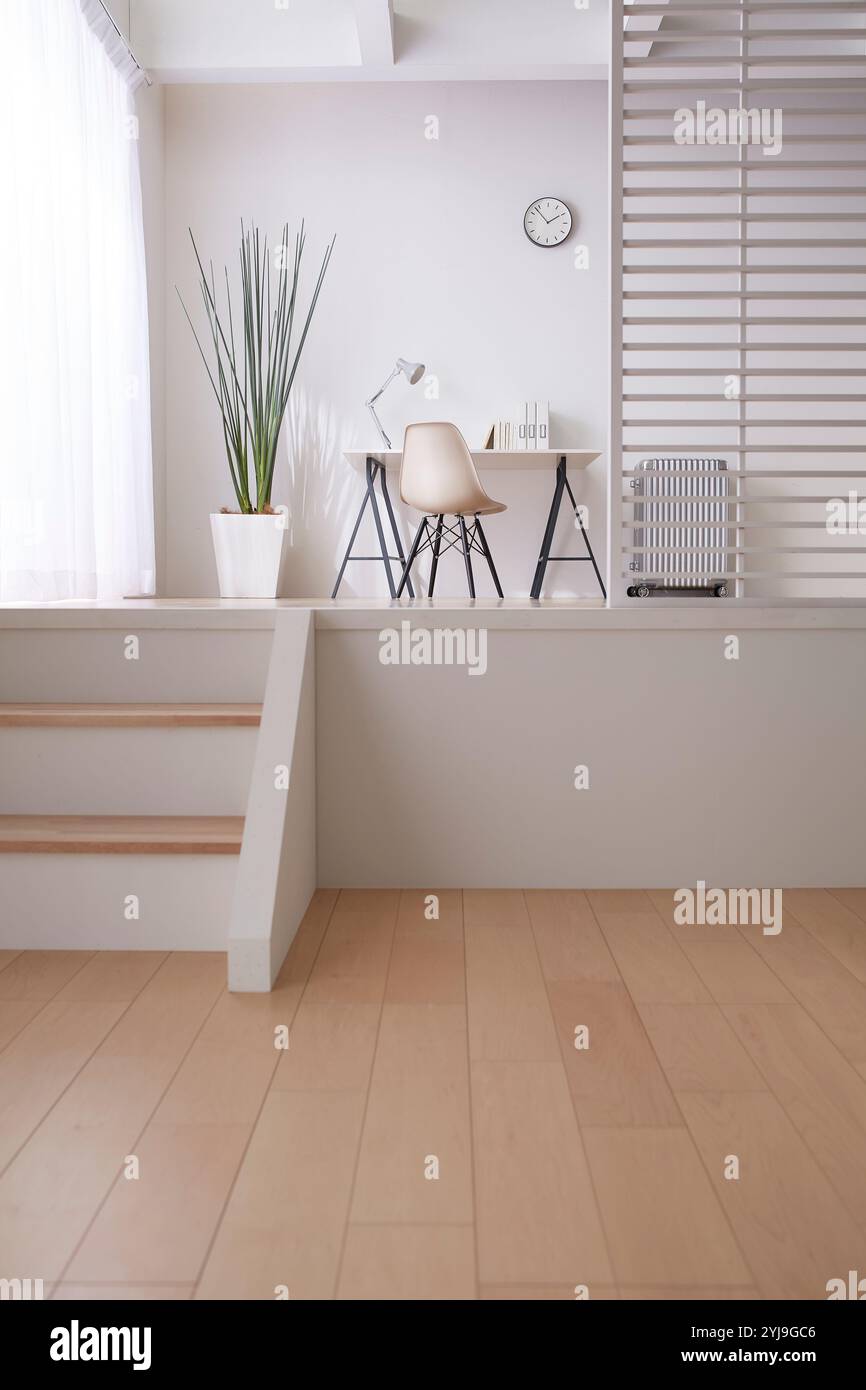Simple room with step floor Stock Photo - Alamy