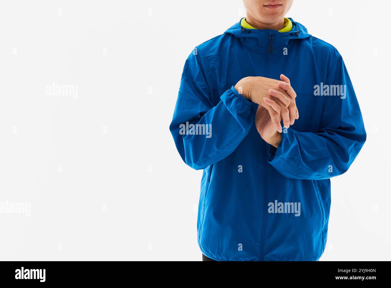 Male track and field athlete doing preparatory exercises Stock Photo ...