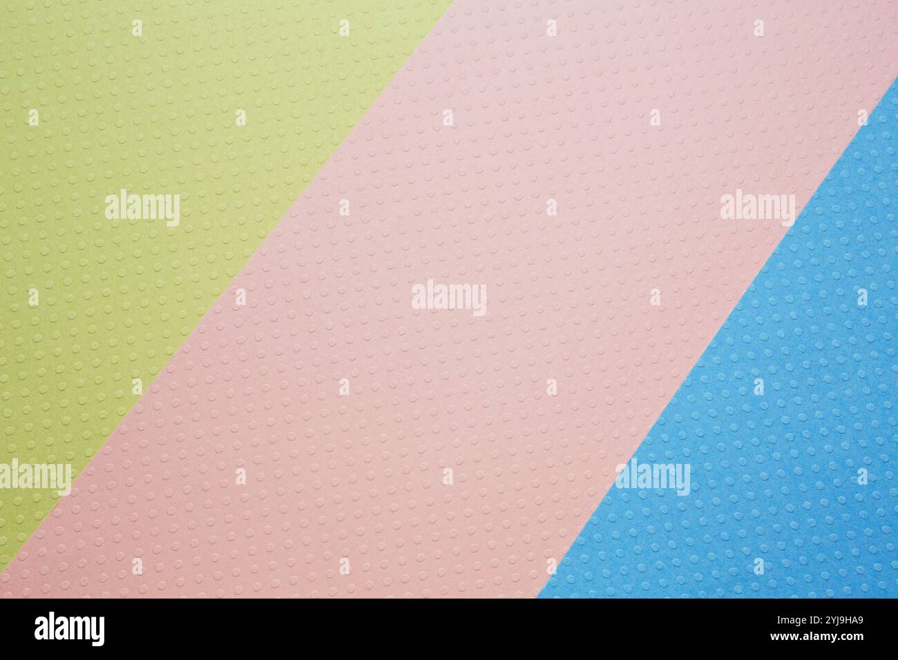 Three different coloured papers Stock Photo - Alamy