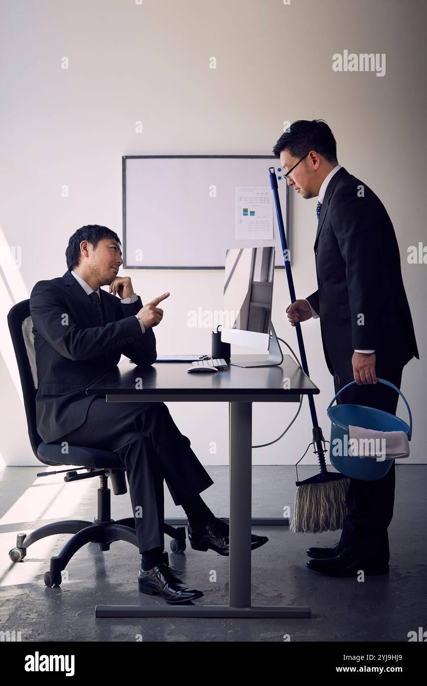 Man bullying a woman and office hi-res stock photography and images - Alamy