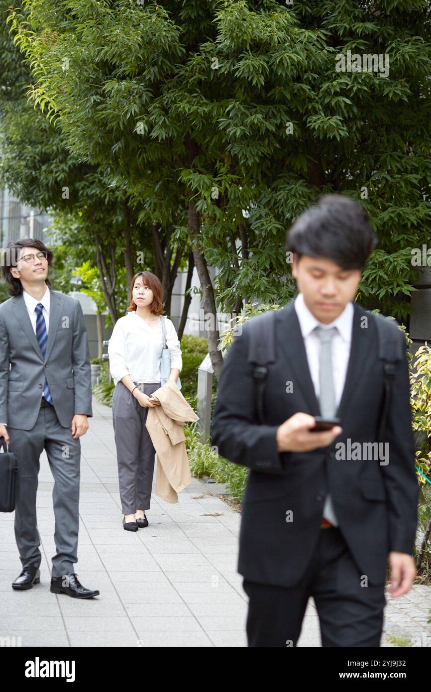 Employees walking hi-res stock photography and images - Alamy