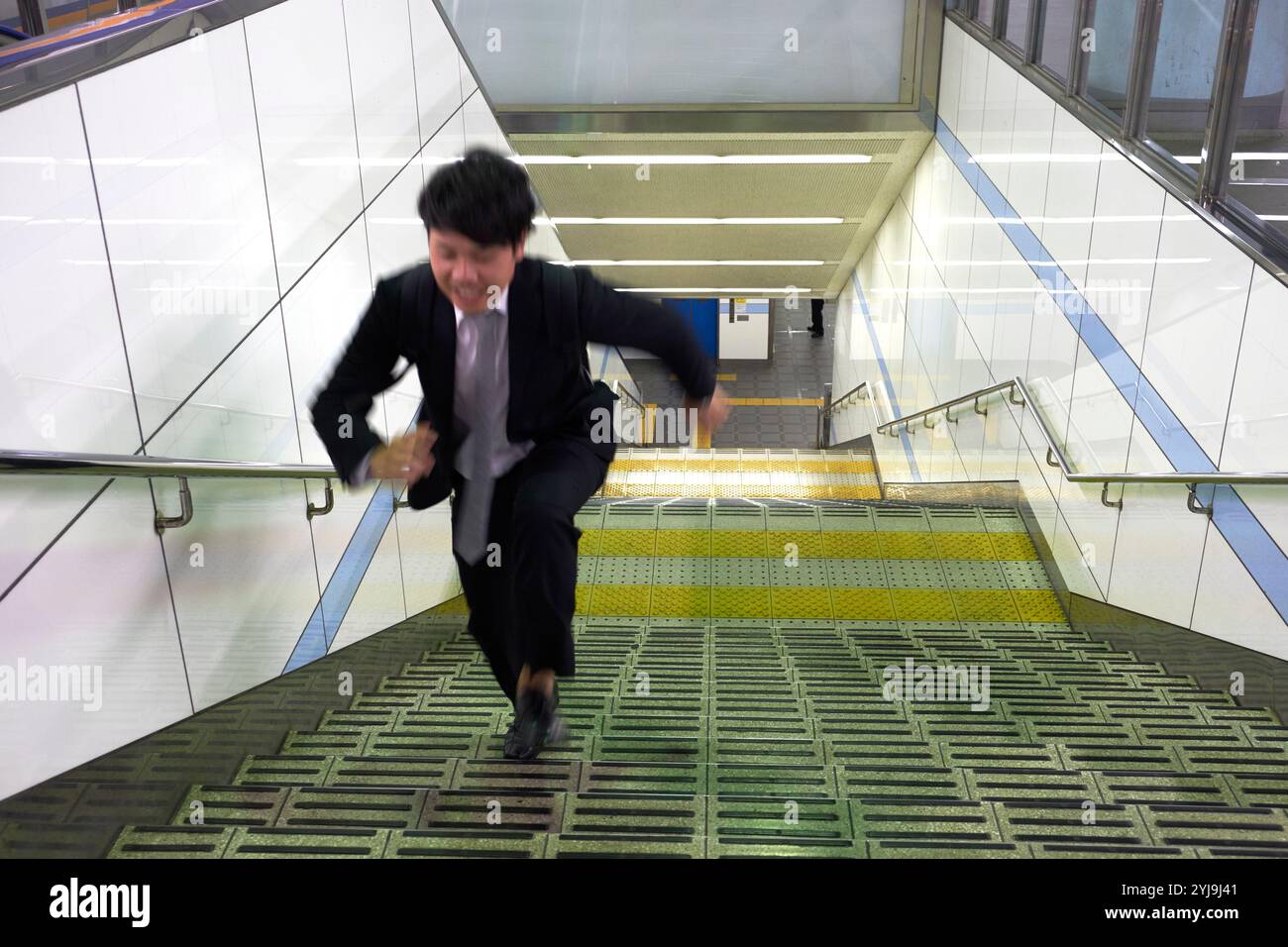 Running up the stairs hi-res stock photography and images - Alamy