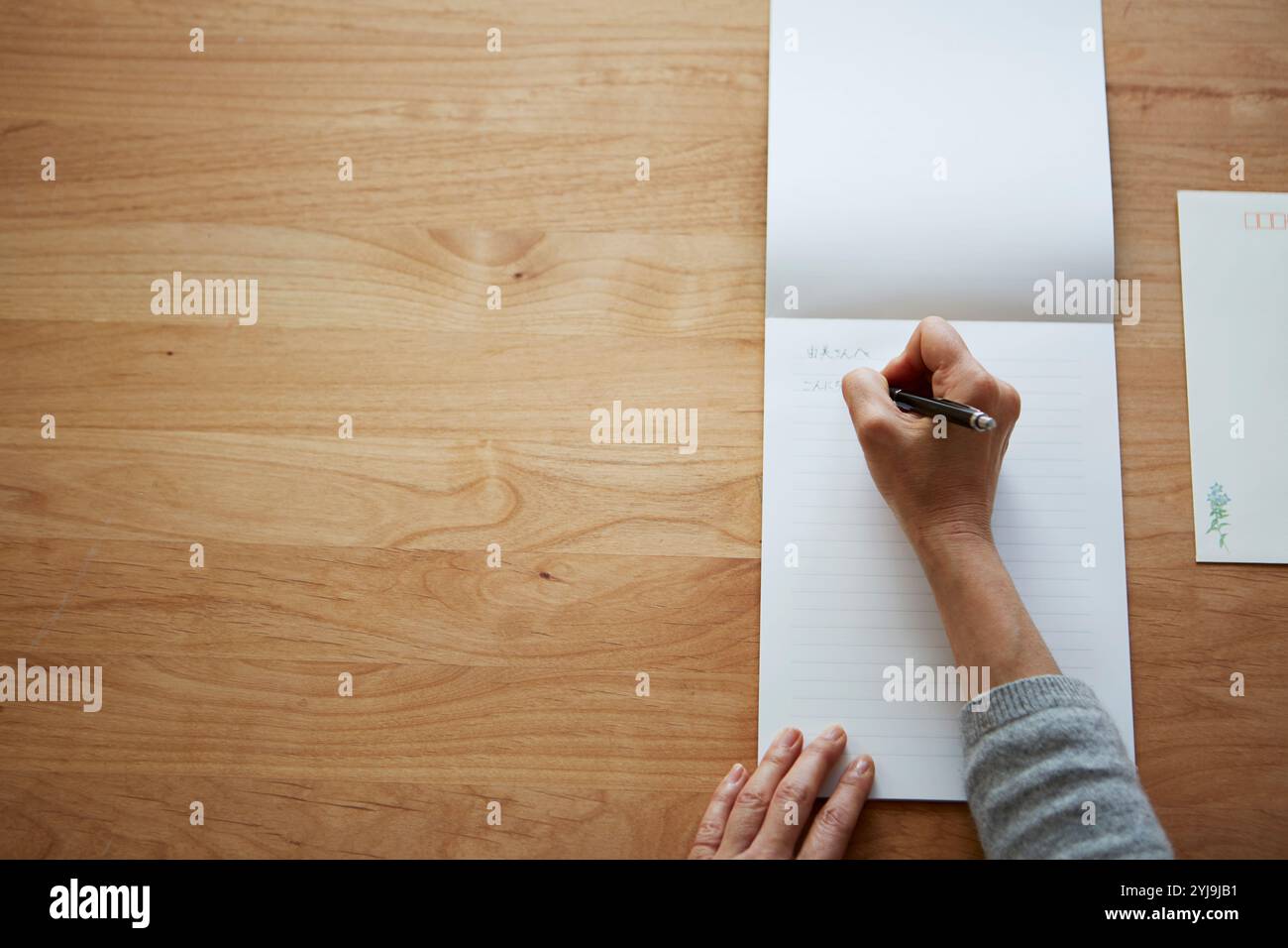 Woman writing letter hi-res stock photography and images - Alamy