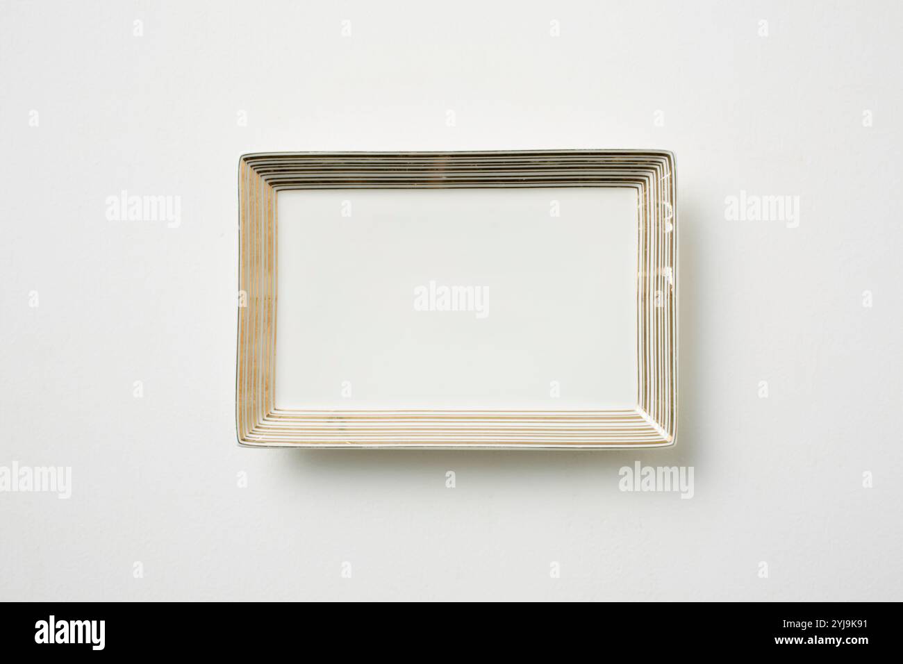 Gold back plate hi-res stock photography and images - Alamy