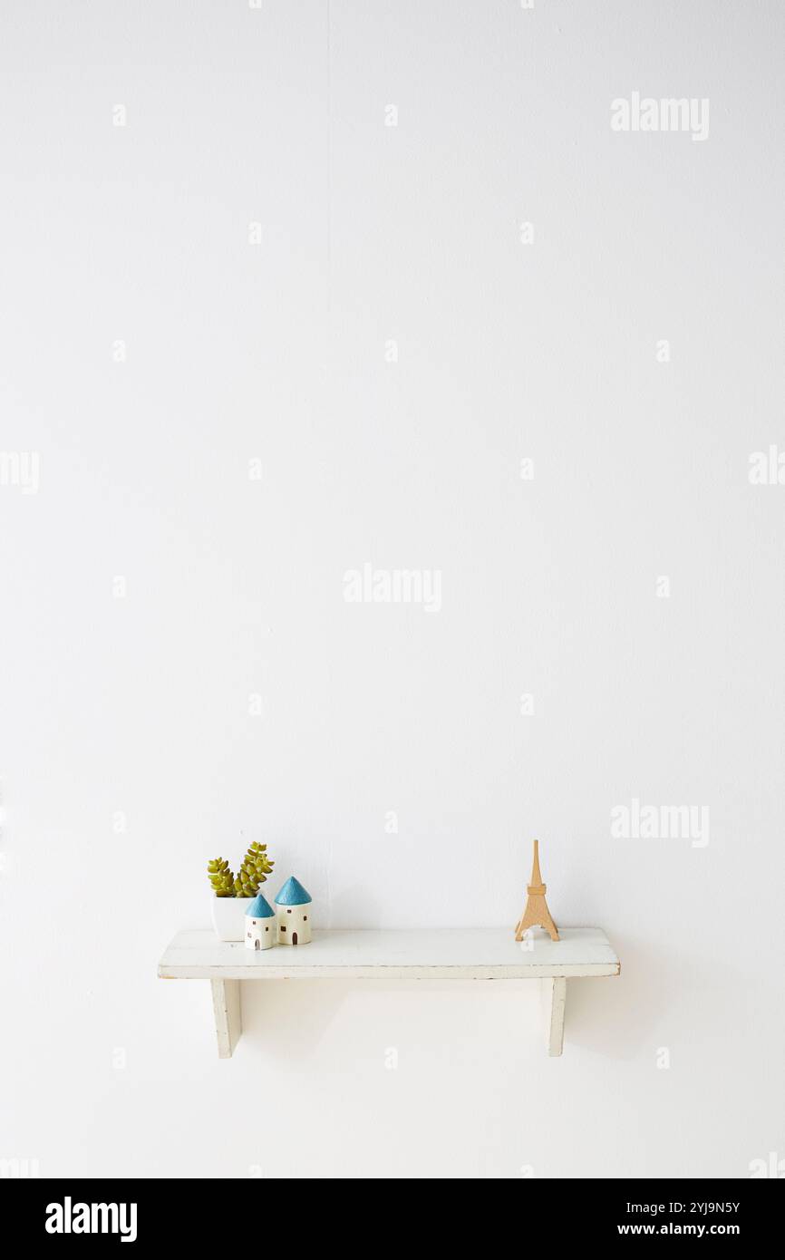 White shelves with sundry items on white walls Stock Photo - Alamy