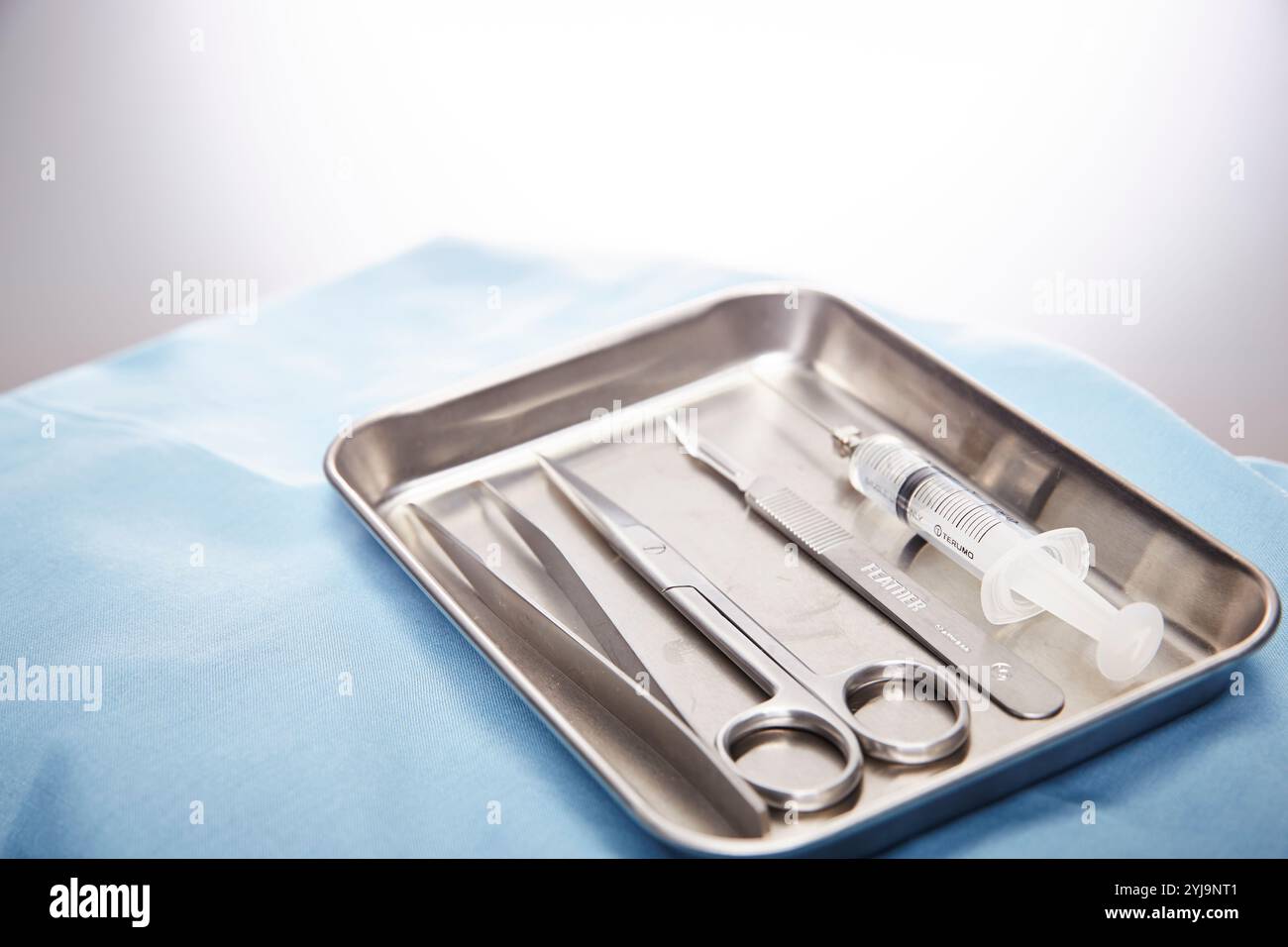 Surgical instruments lined up on a bat Stock Photo - Alamy