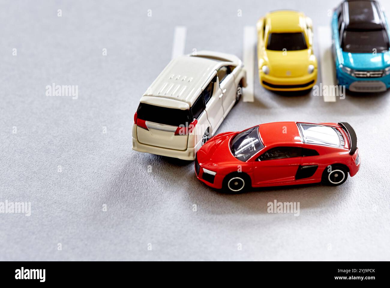 Four miniature cars Stock Photo - Alamy