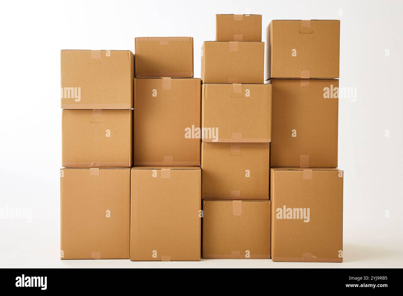 Many piles of cardboard boxes Stock Photo - Alamy