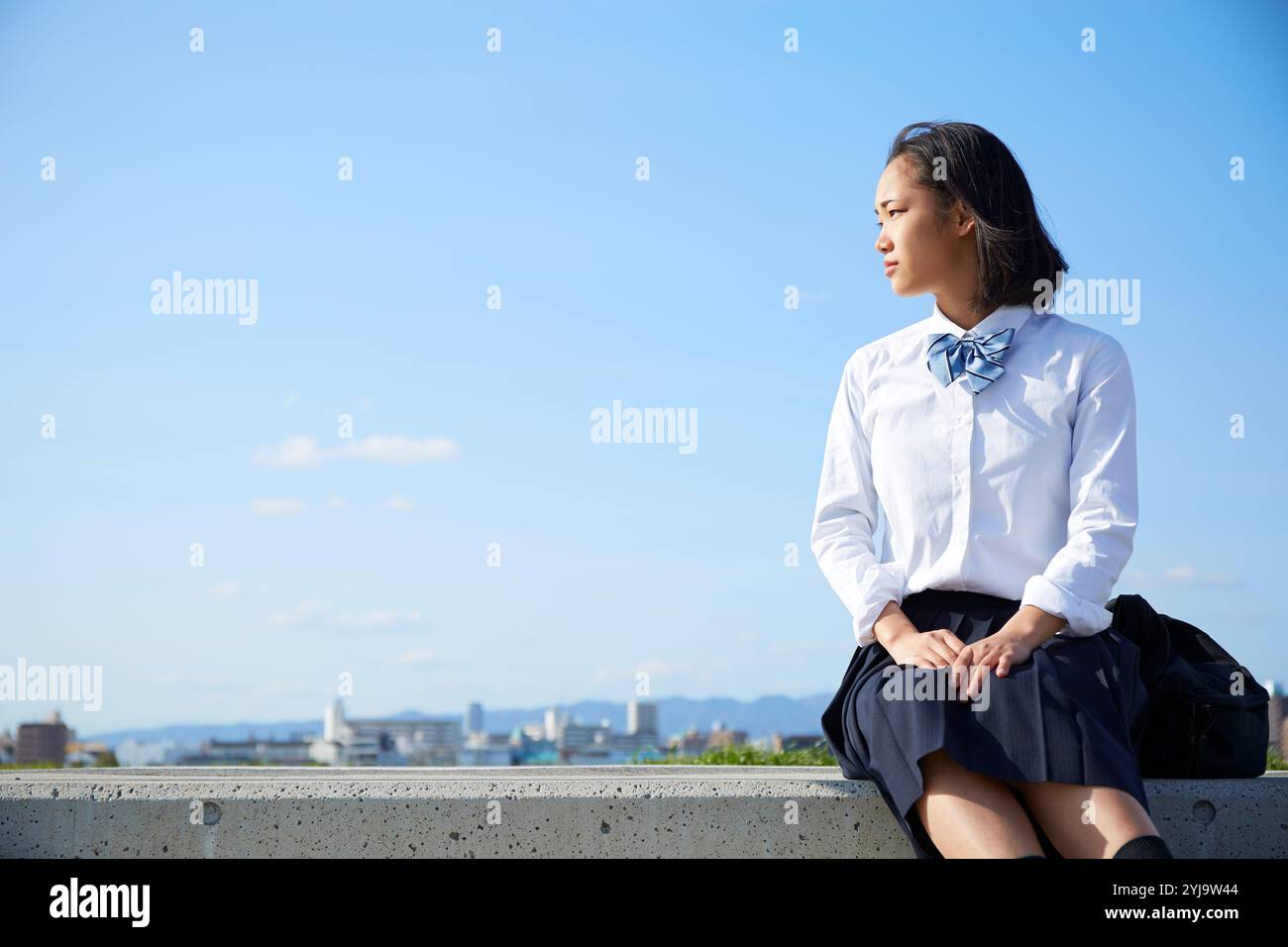 Girls school uniform from the back hi-res stock photography and images ...