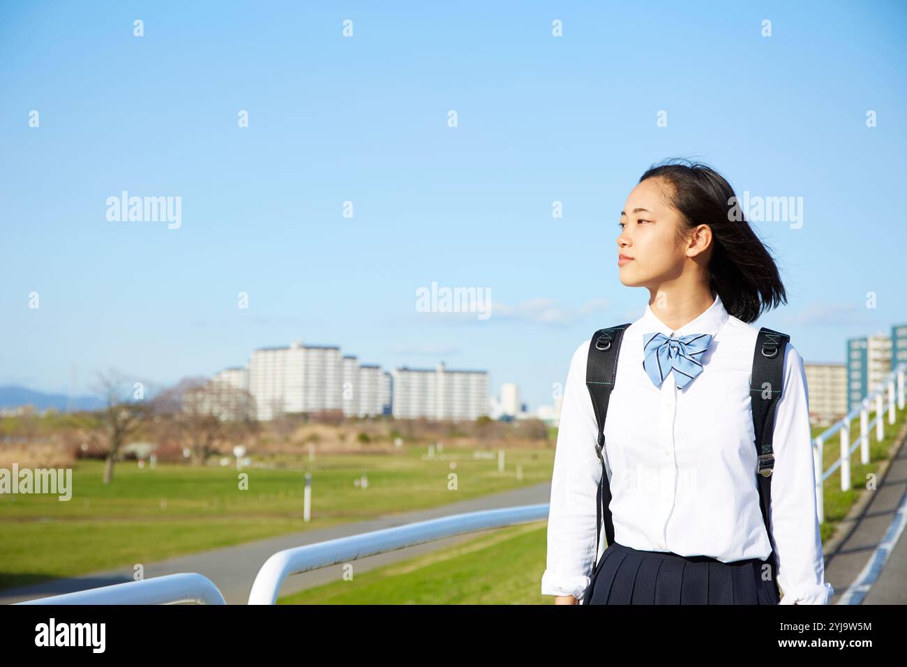 School girl back view uniform hi-res stock photography and images - Alamy