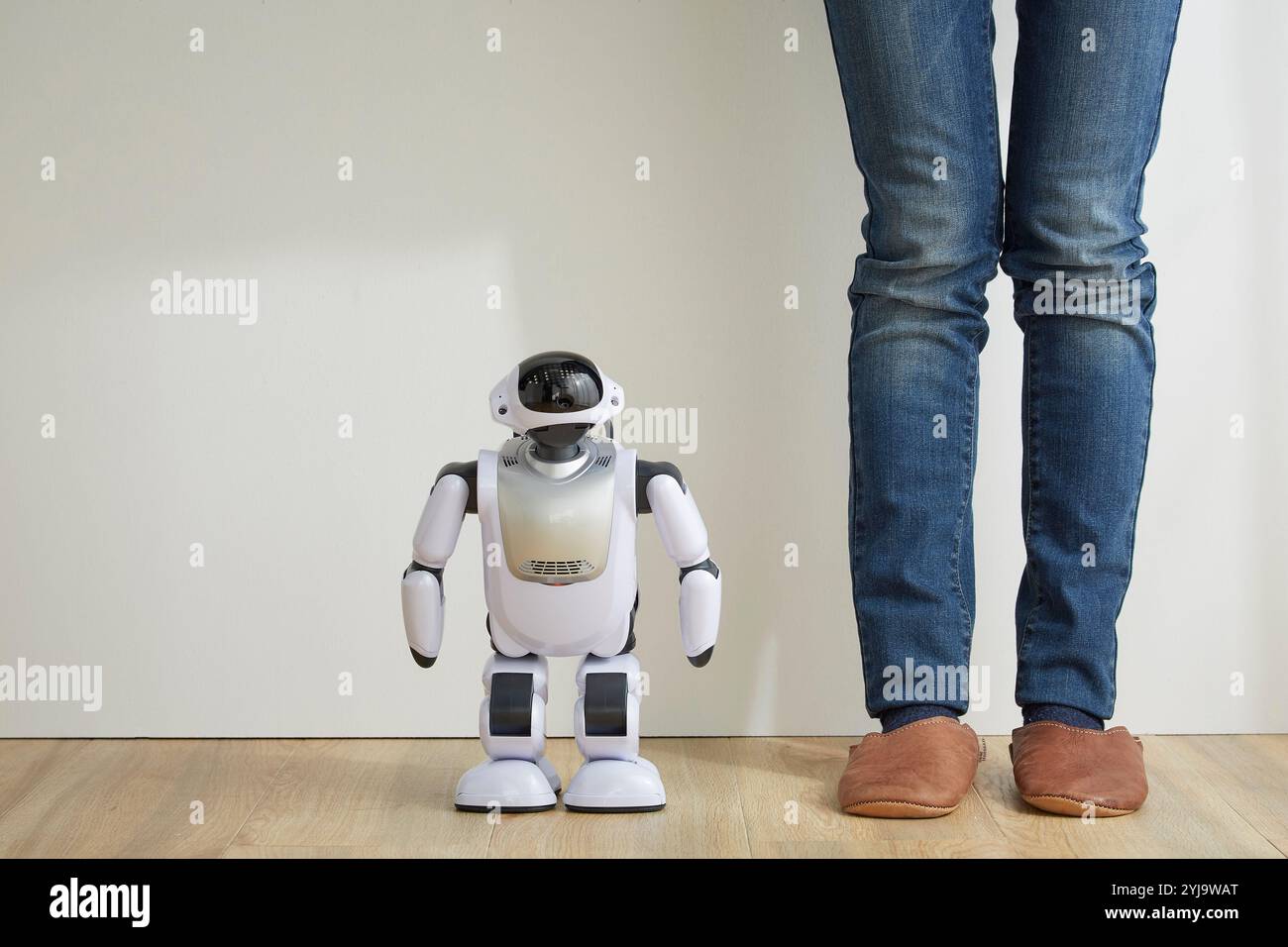 Standing woman with legs and robot Stock Photo - Alamy