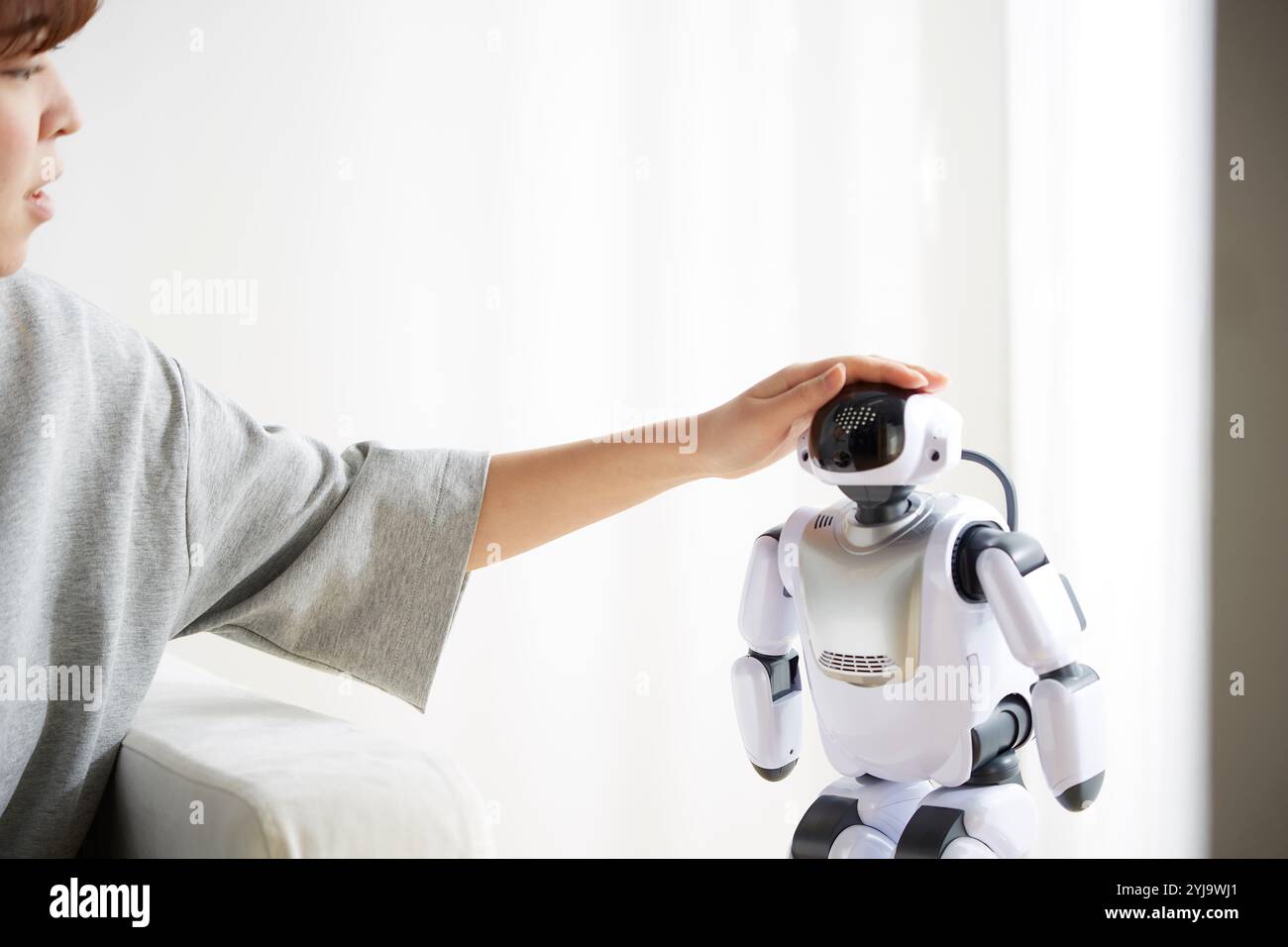 Patting a head hi-res stock photography and images - Alamy