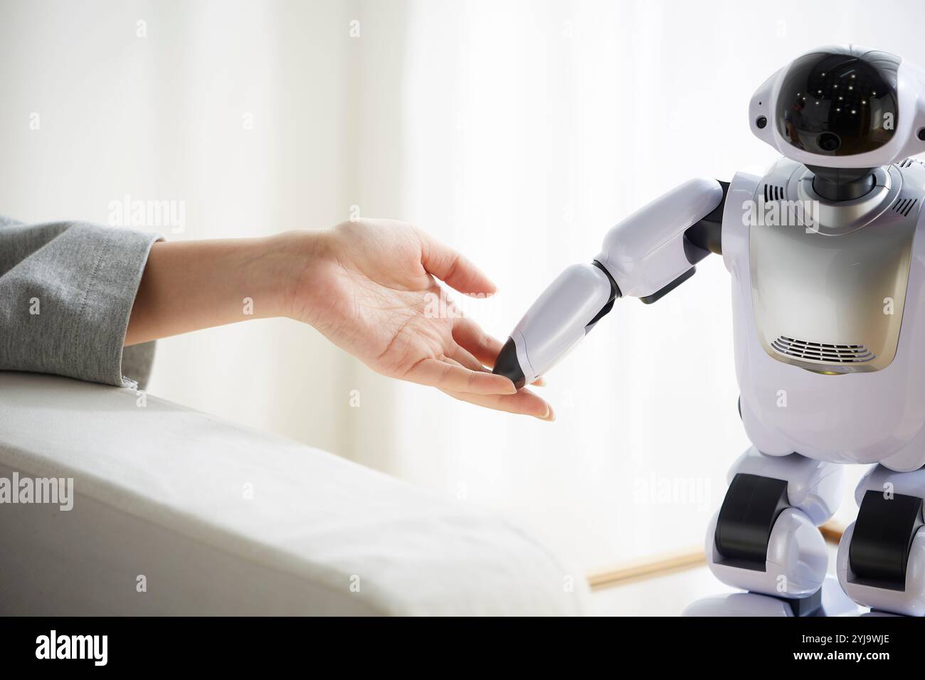 People touch touching robot robots hi-res stock photography and images ...