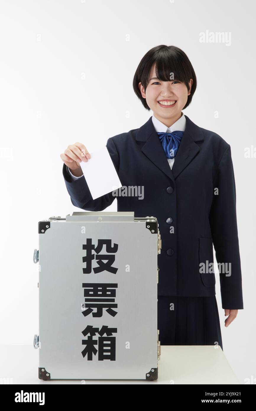 Female student voting Stock Photo - Alamy