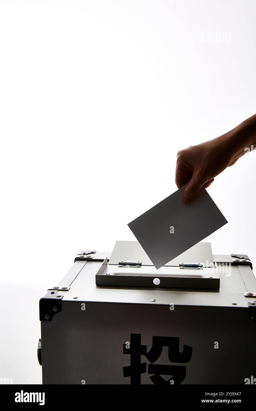 Silhouettes of hands of people voting Stock Photo - Alamy