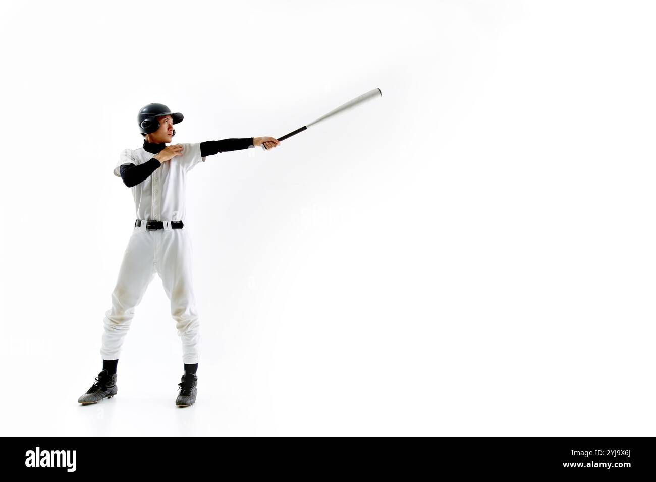 Man holding a bat Stock Photo - Alamy