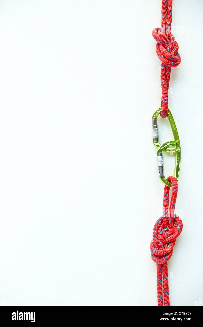 Connected rope and carabiner Stock Photo - Alamy