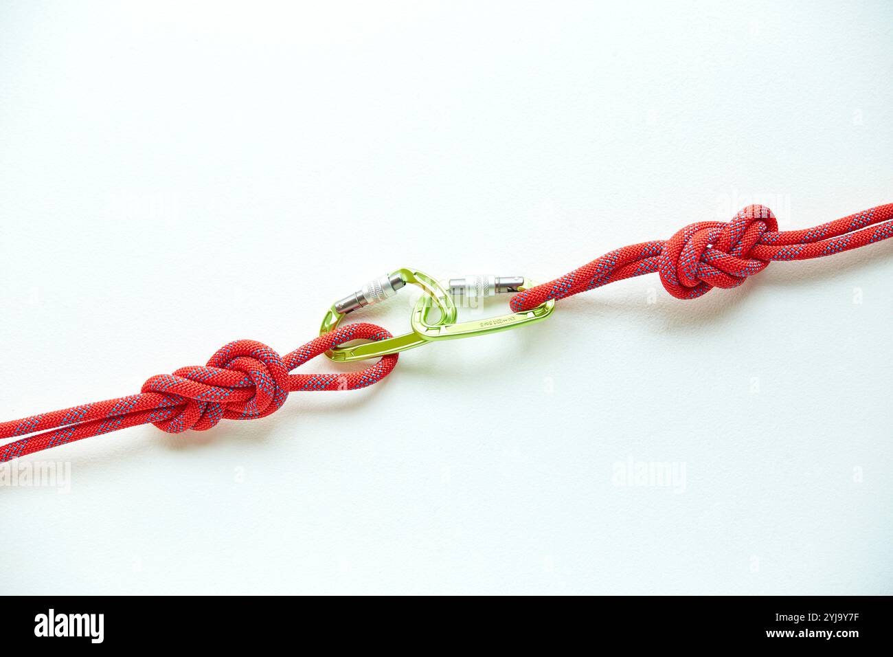 Connected rope and carabiner Stock Photo - Alamy