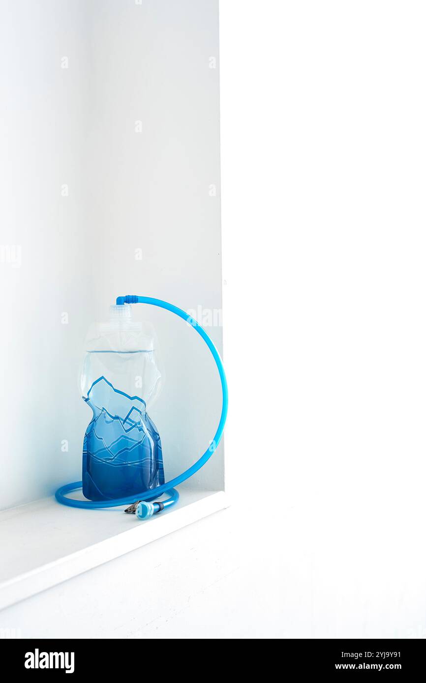 Blue hydration placed within a white frame Stock Photo - Alamy