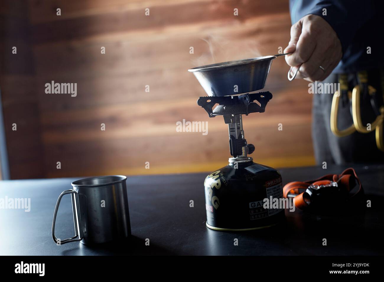 Man using portable gas stove hi-res stock photography and images - Alamy