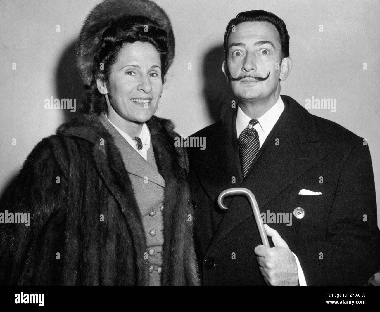 Spanish surrealist artist Salvador Dalí with his wife Gala, arriving in ...