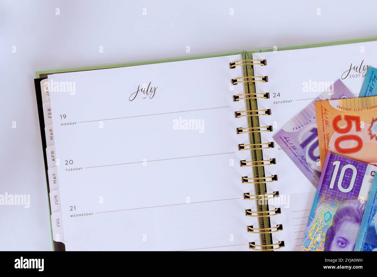 Collection of Canadian dollar banknotes cash bills into calendar ...