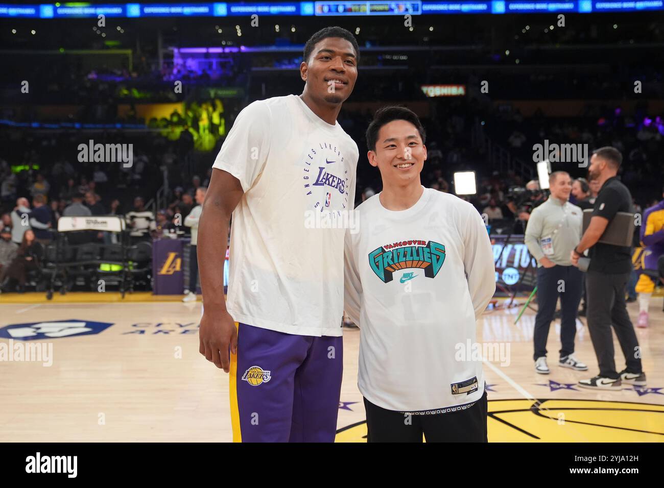 Los Angeles Lakers forward Rui Hachimura, left, poses for a photo with ...